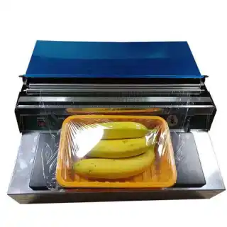 Manual tray cling film wrapping machine