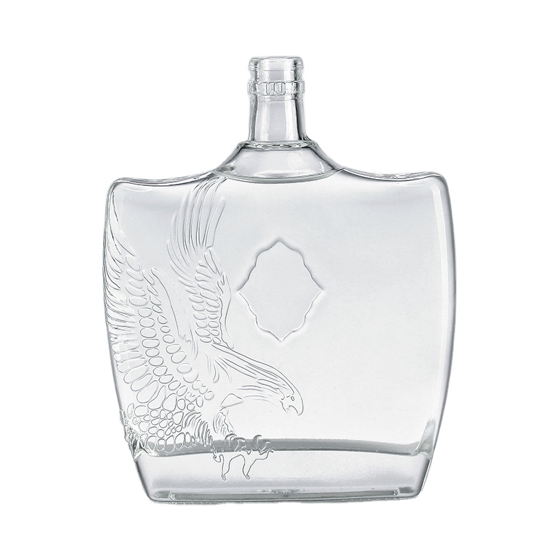 Glass bottle with embossed pattern