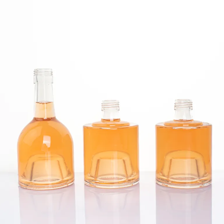 Small round stackable glass wine bottle