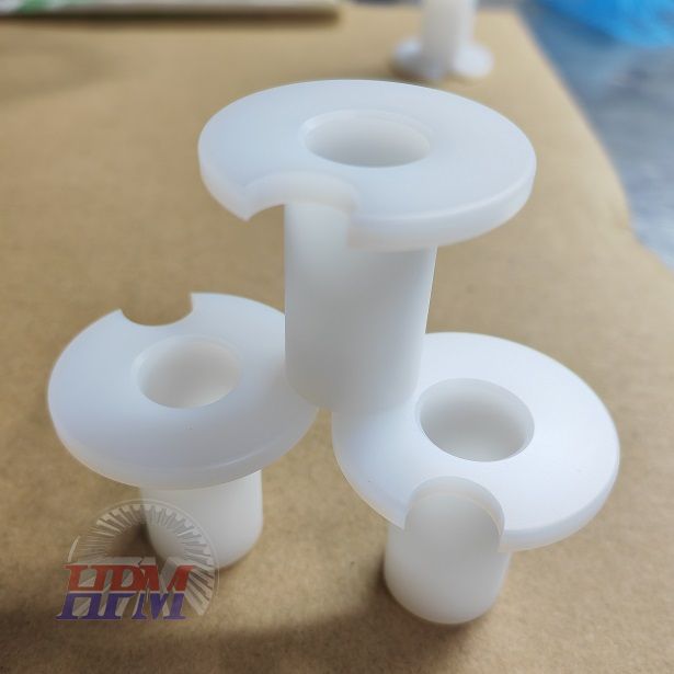Custom PA66/POM/PEEK Coil Clamps: CNC Turning & Milling with Cleaning