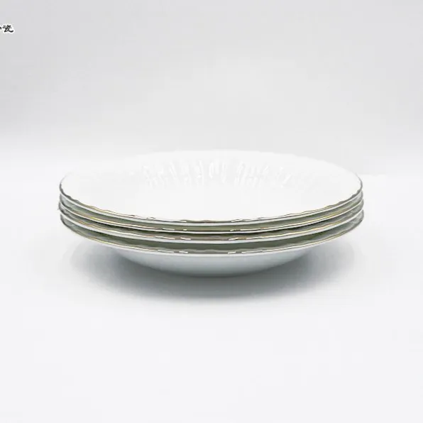 Bone china soup plate with gold rim