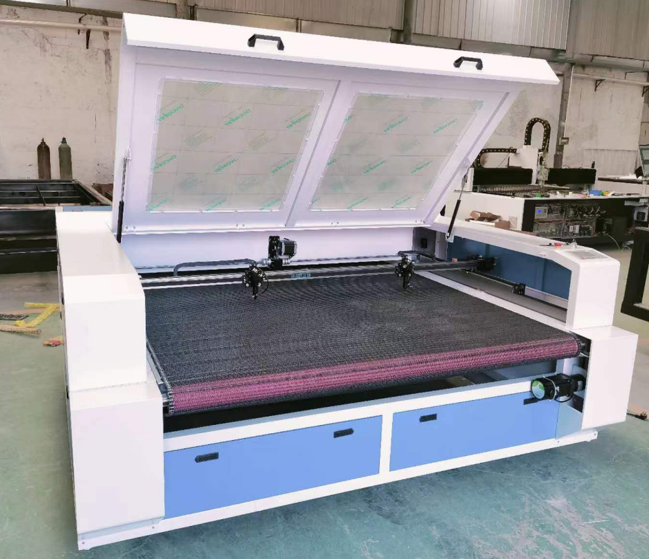 Fabric laser cutting machine - auto feeding system