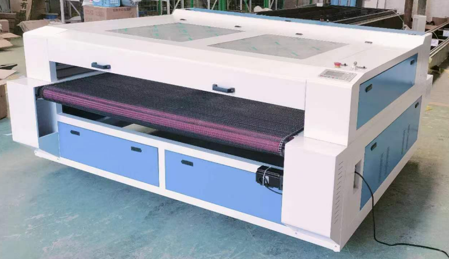 Fabric laser cutting machine - auto feeding system