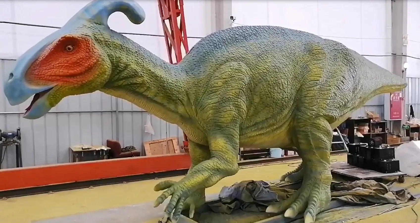 "beside crested lizard"----Parasaurolophus