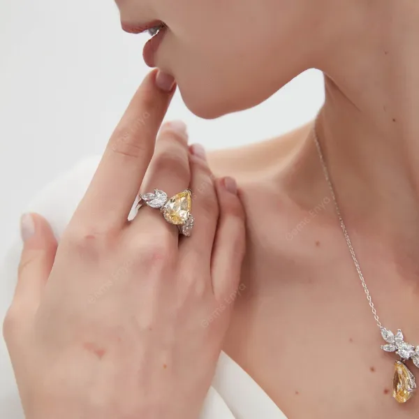 yellow stone ring, pear cut engagement ring, bow ring