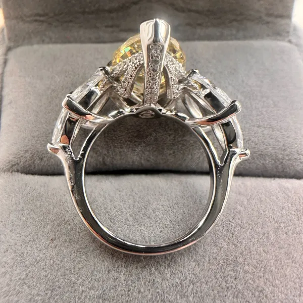 yellow stone ring, pear cut engagement ring, bow ring