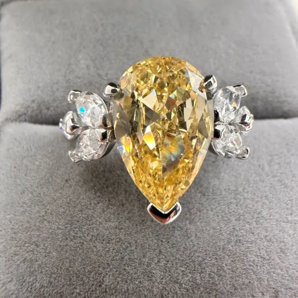 yellow stone ring, pear cut engagement ring, bow ring