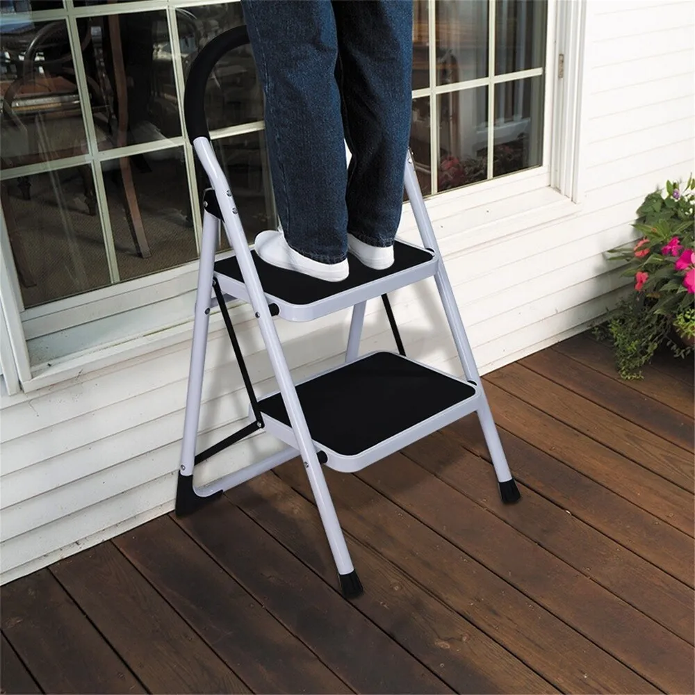 Portable step ladder with sponge on handrail