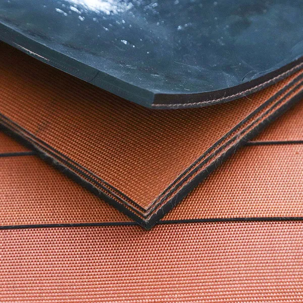 Fabric core rip-stop conveyor belts