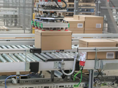 What is an automatic box making machine, and how does it work?