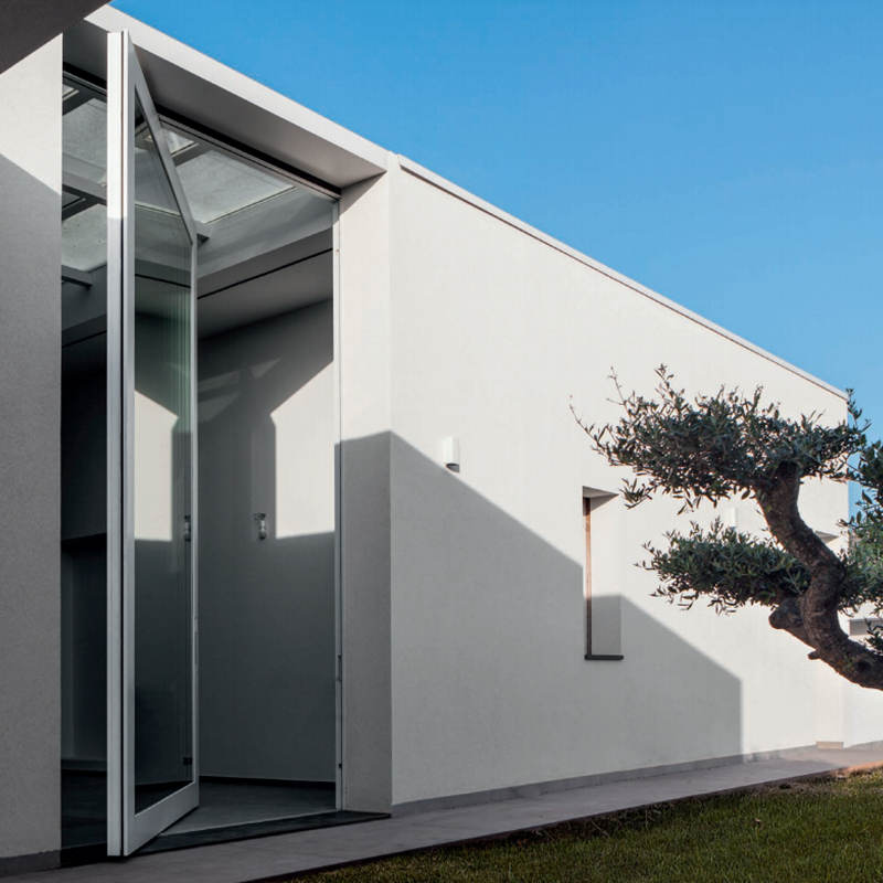 Minimalist all-glass offset door
