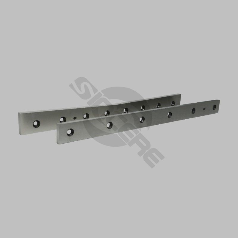 How are metal shear blades sharpened or maintained?