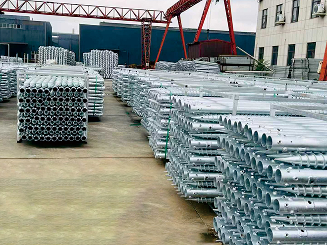 What are the steps in the construction process of screw ground piles?